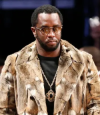 Sean "Diddy" Combs Biography - From Harlem Roots to Global Icon
